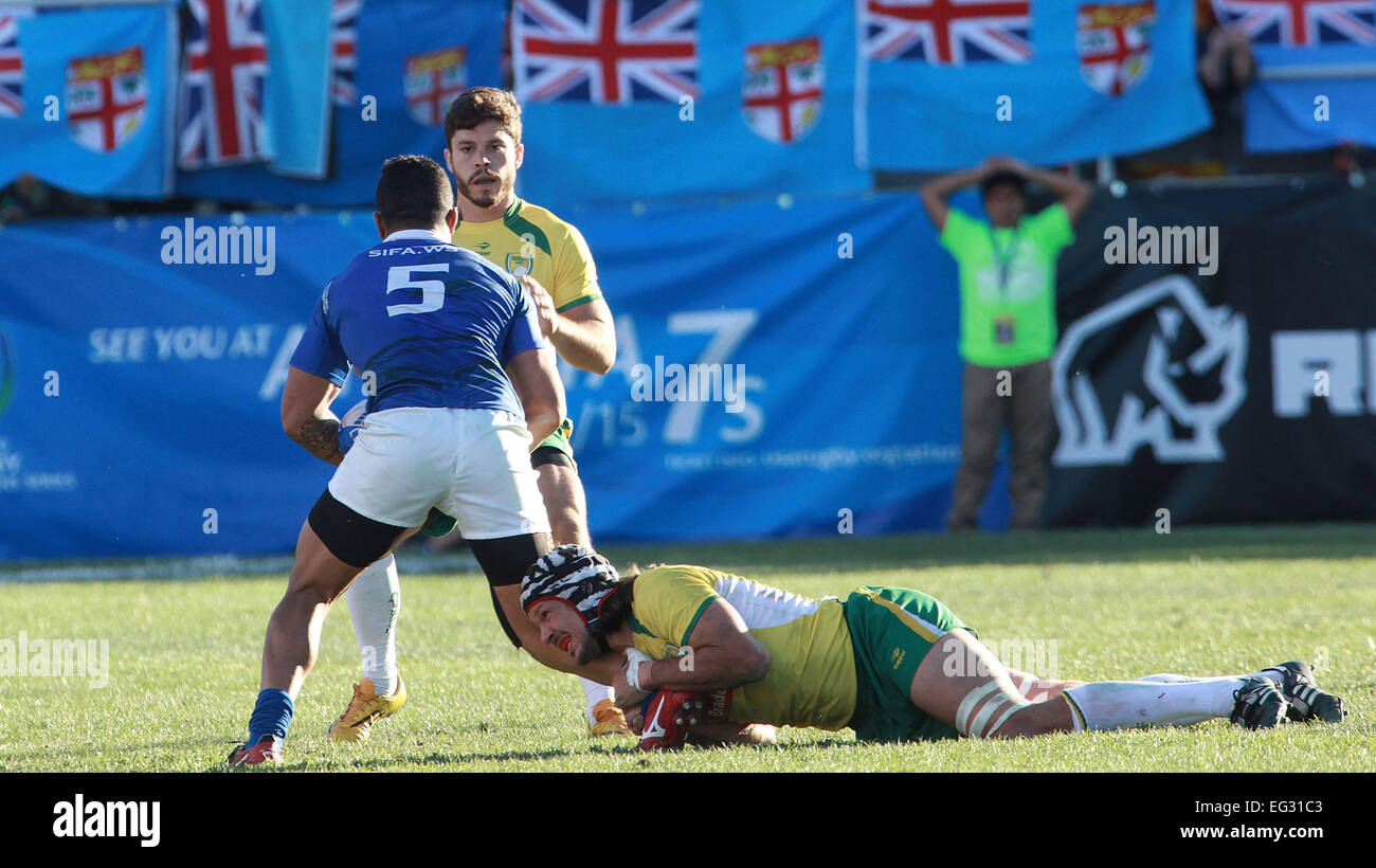 Las Vegas, Nevada, USA. 14th Feb, 2015. Samoa's Gregory Foe get hit by ...