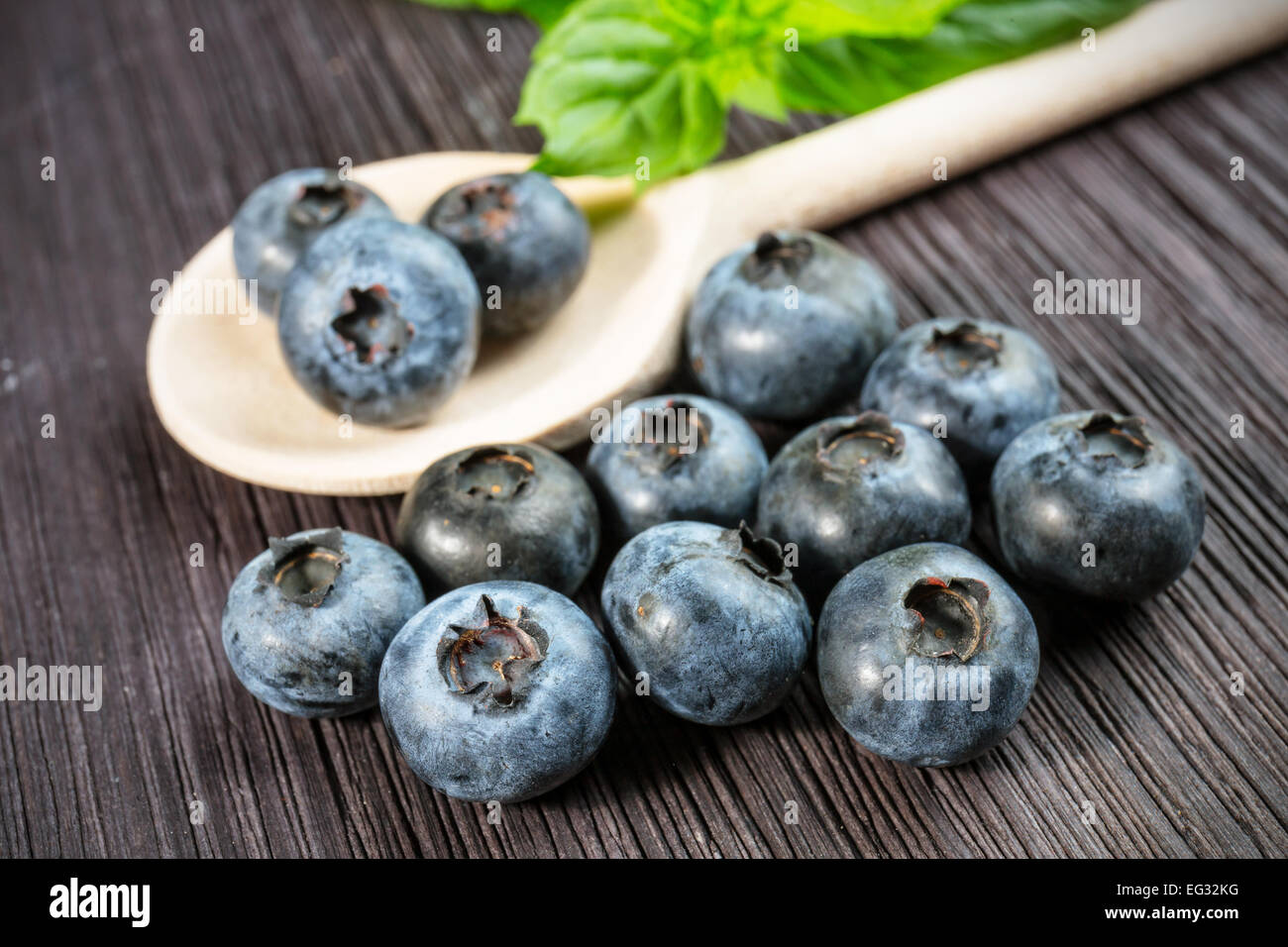 Blueberry on wooden board Stock Photo - Alamy