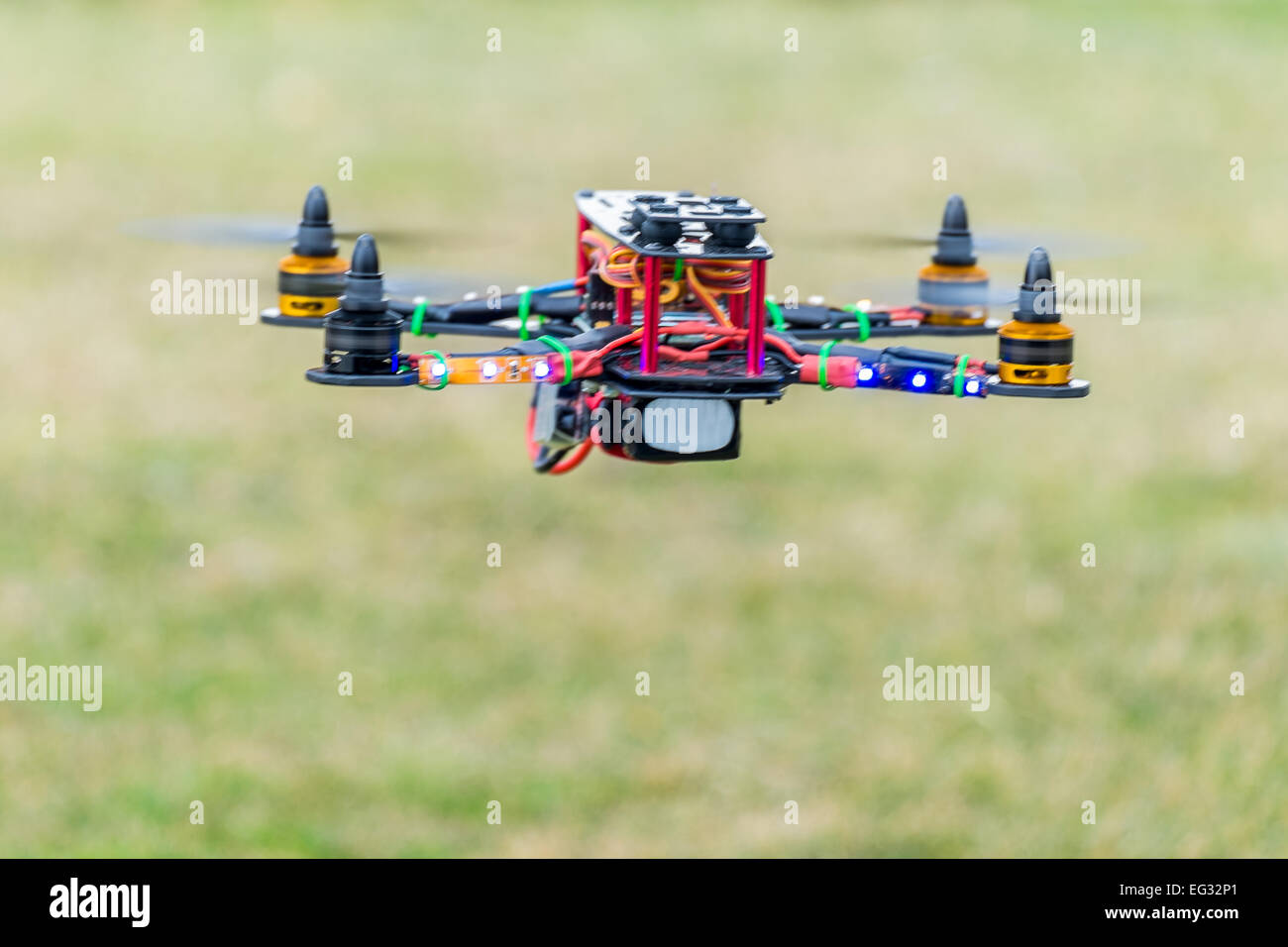 Drone flying over grass hi-res stock photography and images - Alamy