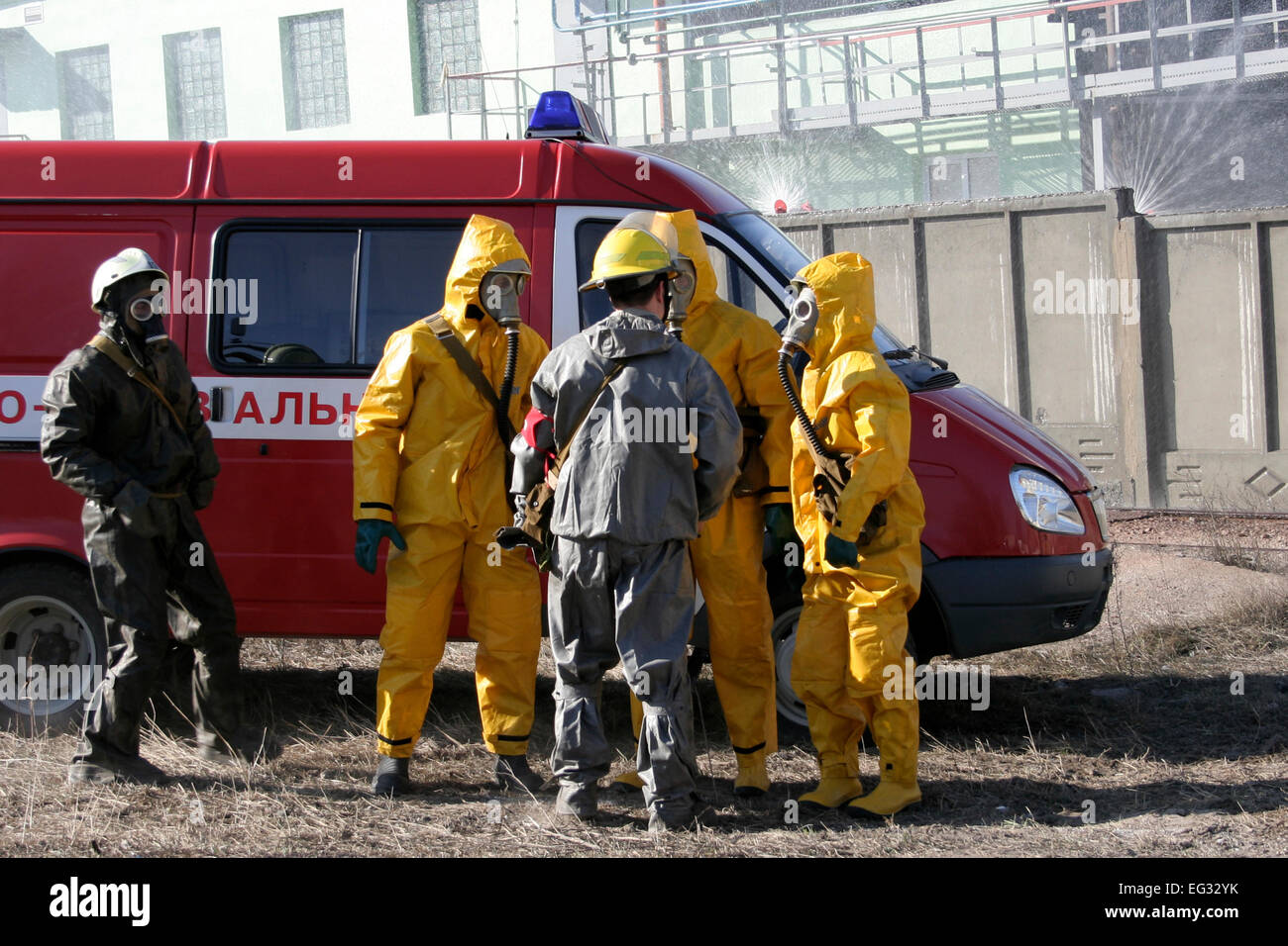 Man in chemical protection suit, carrying out the decontamination area ...