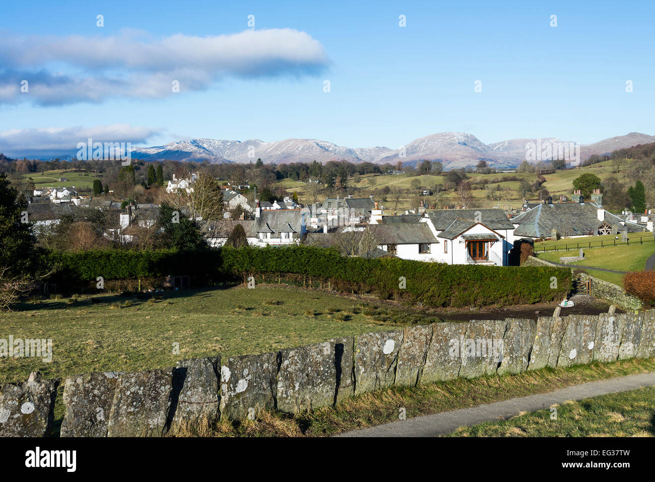 The Beautiful Hawkshead Village with the Lakeland Mountains in the ...