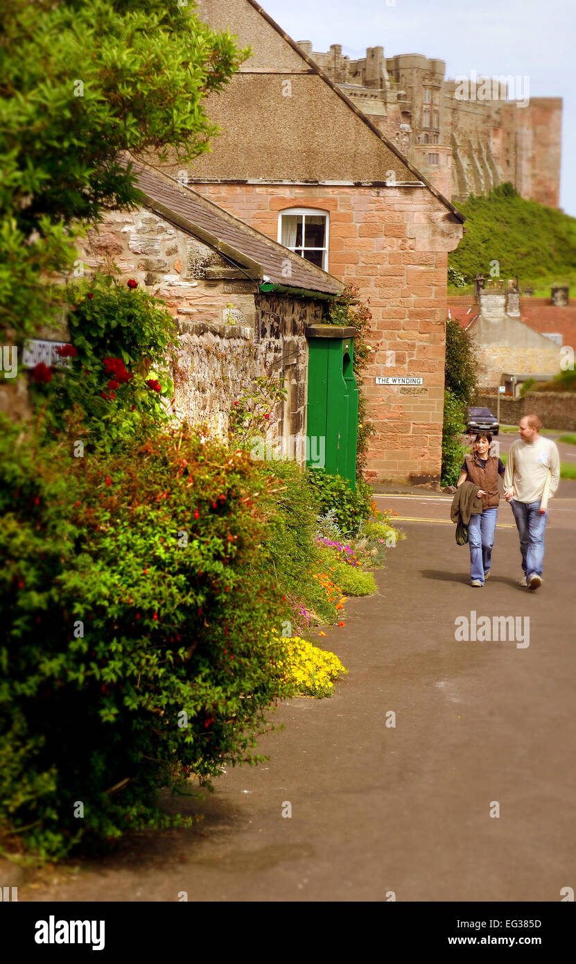 View of Bamburgh Castle and village Stock Photo - Alamy