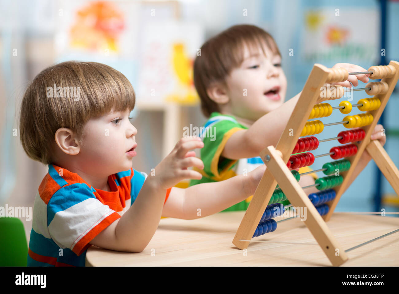 kids playing with abacus Stock Photo - Alamy