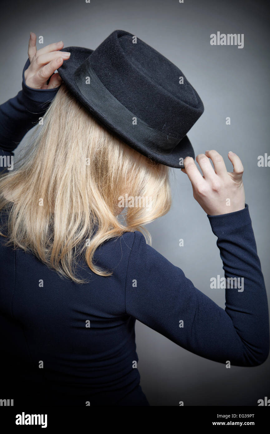 Girl in hat tilting hi-res stock photography and images - Alamy