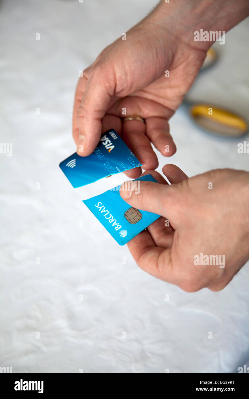 Cutting up credit cards hi-res stock photography and images - Alamy