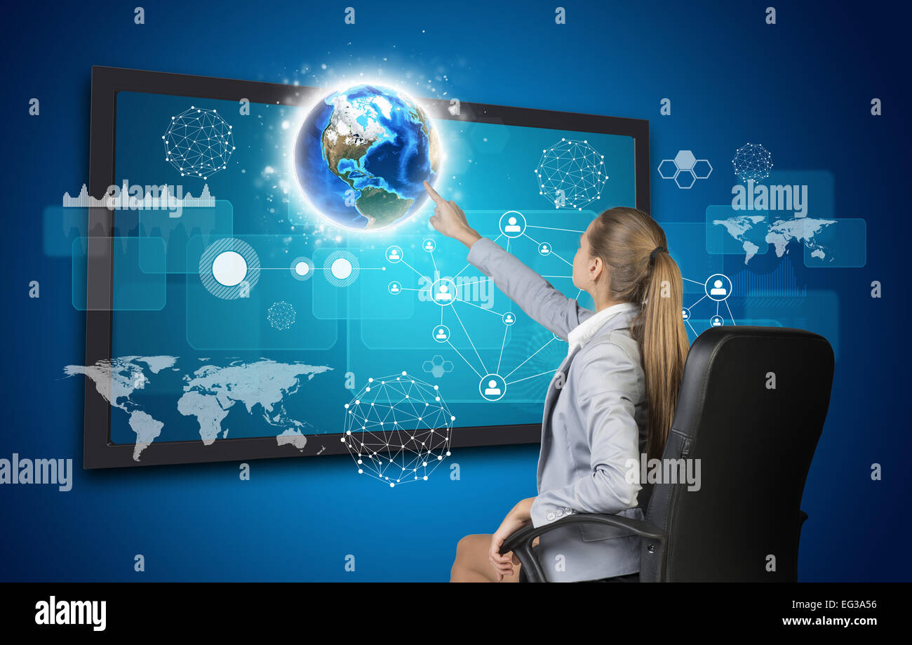 Businesswoman pressing touch screen button on virtual interface Stock ...