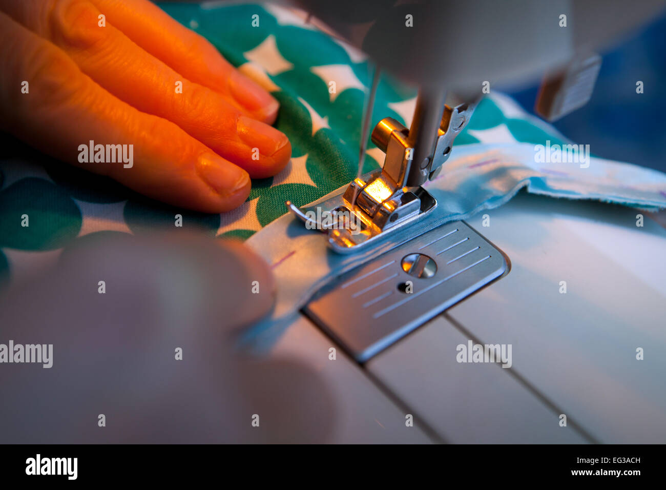 Sewing on sewing machine Stock Photo - Alamy