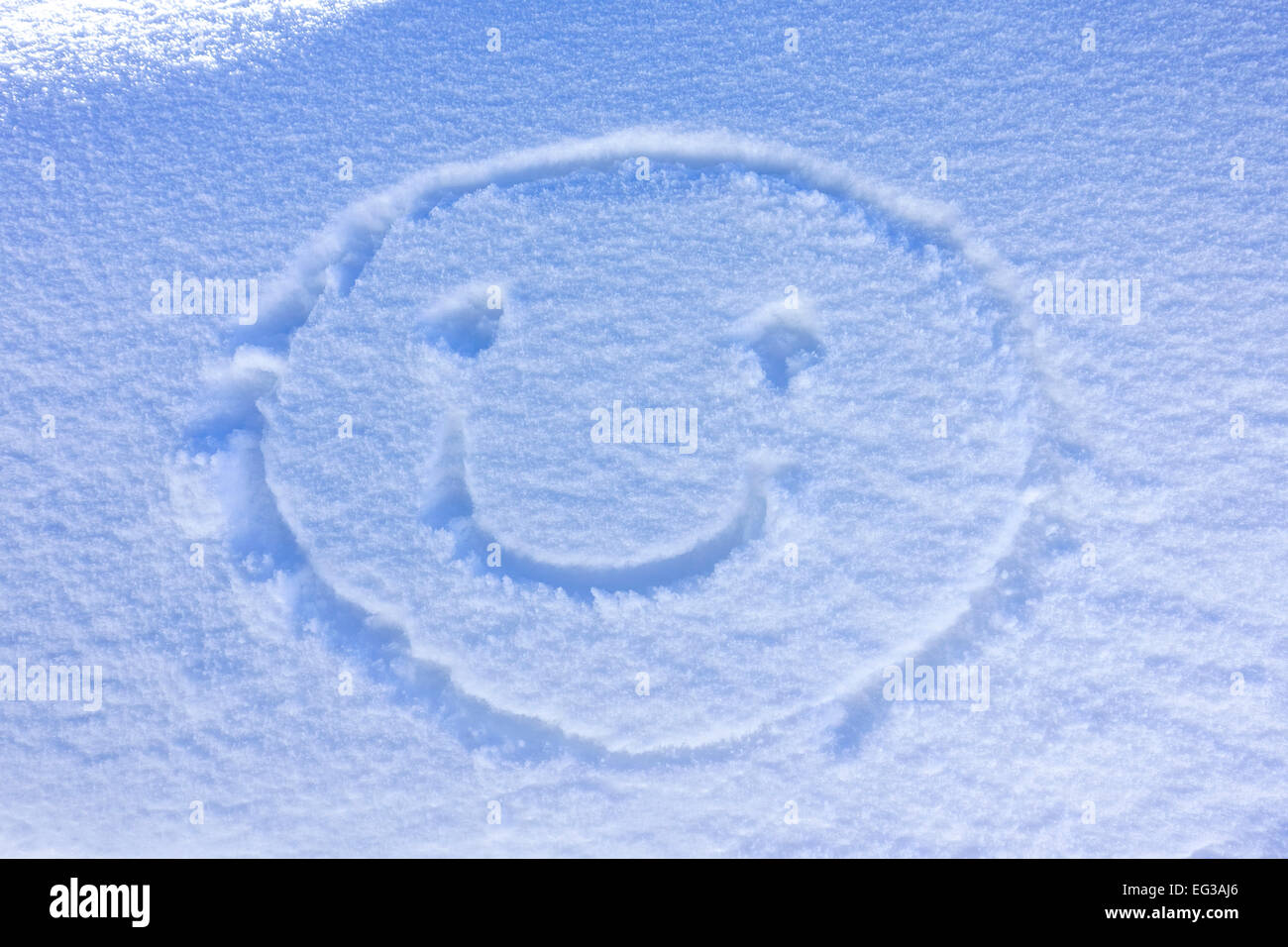 Friendly smiley face in the snow Stock Photo - Alamy