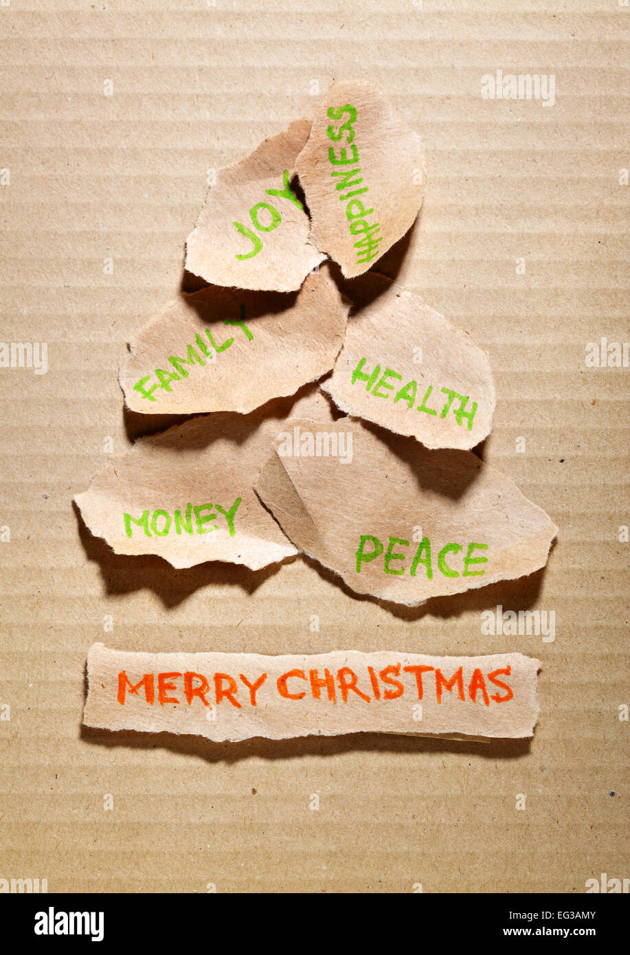 Torn paper Christmas tree with wishes Stock Photo - Alamy
