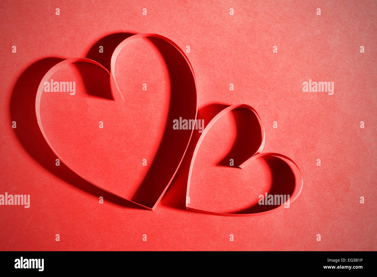 Two paper hearts - card for Valentine's day Stock Photo - Alamy