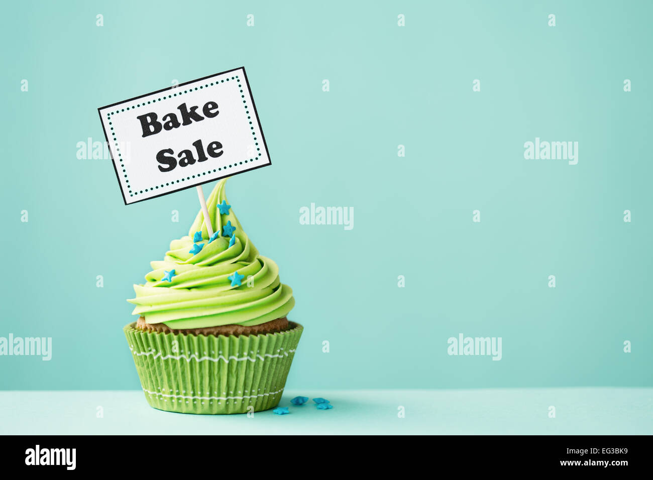 Cupcake with Bake Sale sign Stock Photo - Alamy