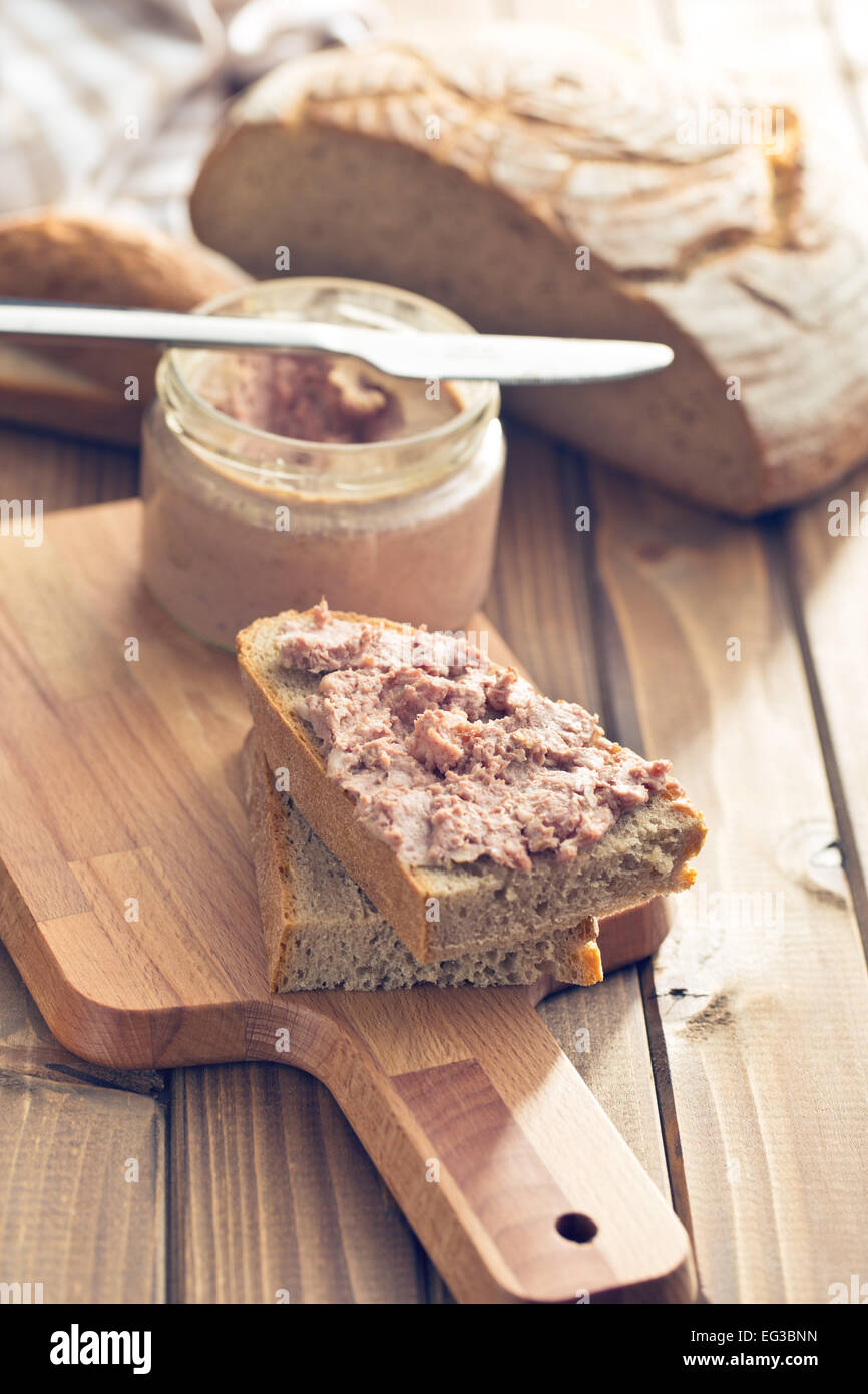 the pate with bread on kitchen table Stock Photo - Alamy