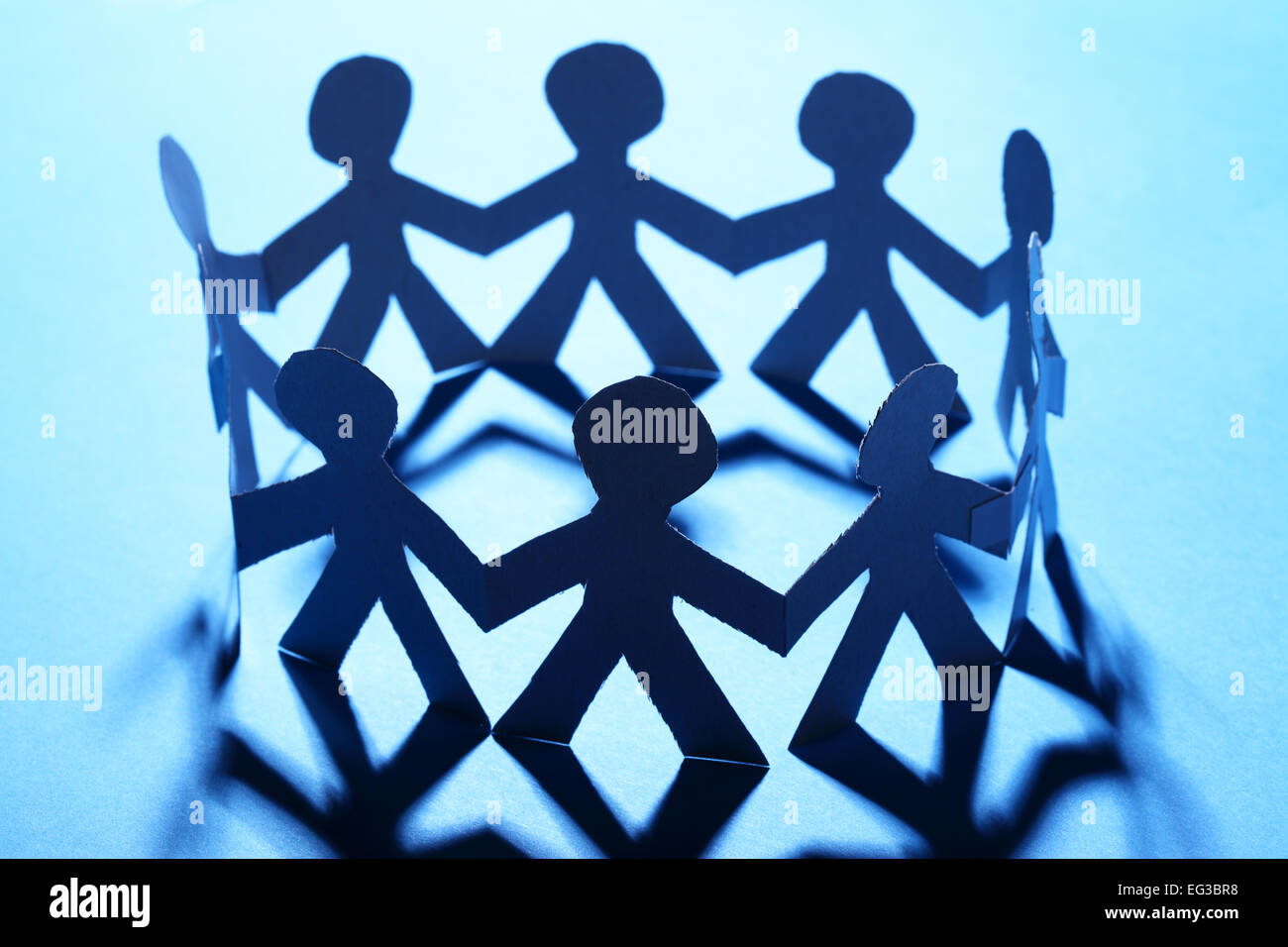 Team of paper people Stock Photo - Alamy