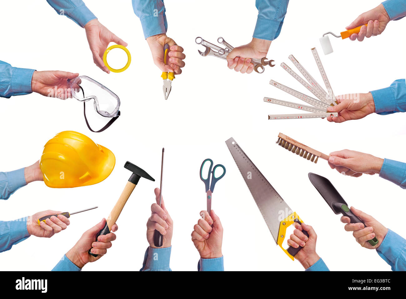 Male worker's hand holding various crafts trade tools. Part of series ...
