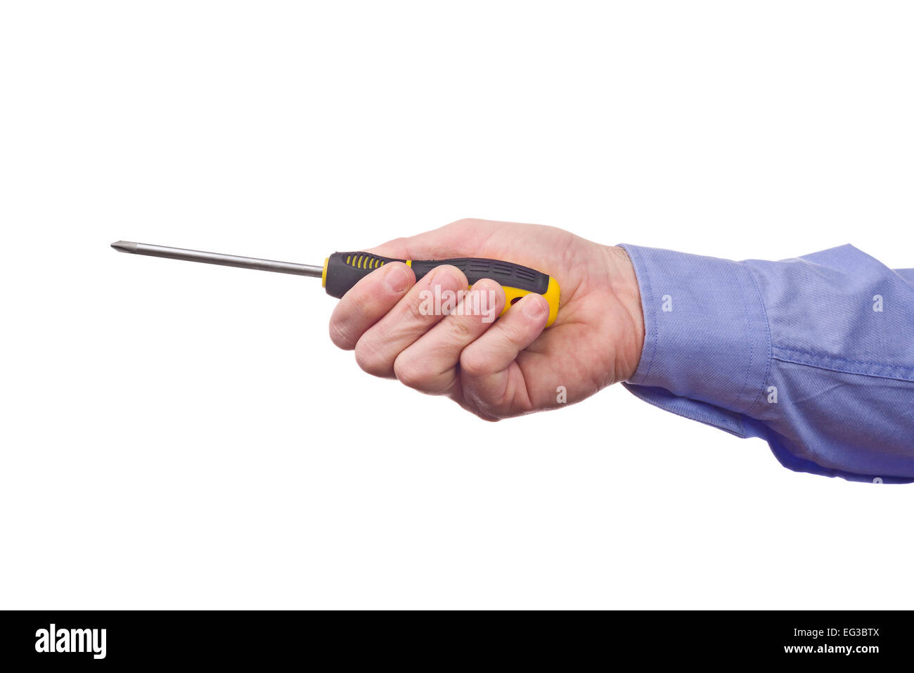 Male worker's hand holding screwdriver. Part of series set of images ...