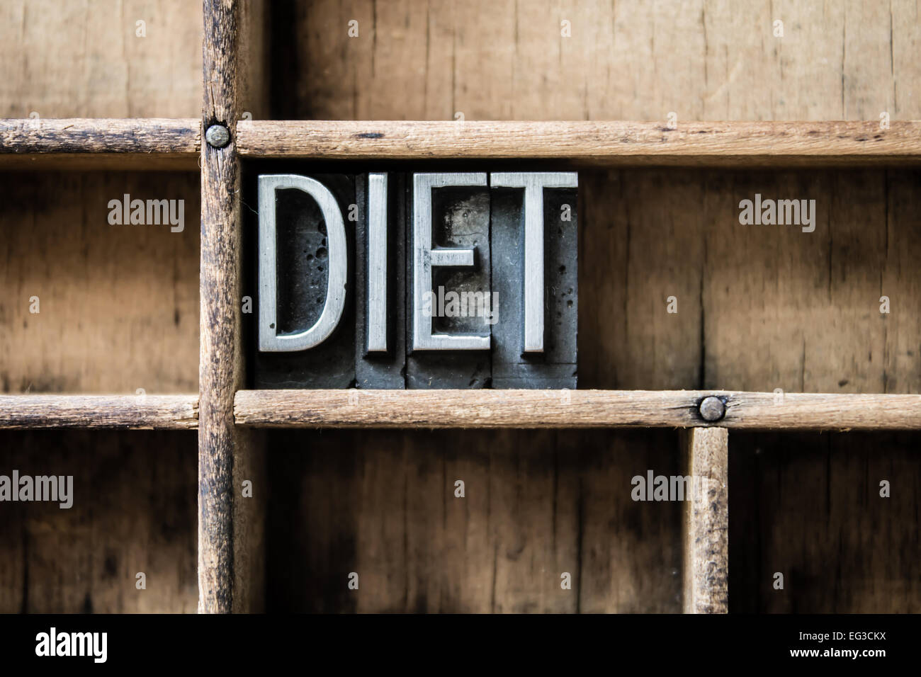 The word "DIET" written in vintage metal letterpress type sitting in a ...