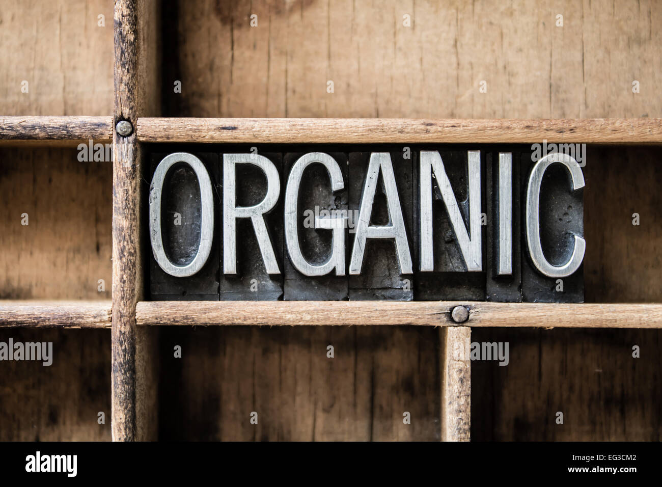 The word "ORGANIC" written in vintage metal letterpress type sitting in ...