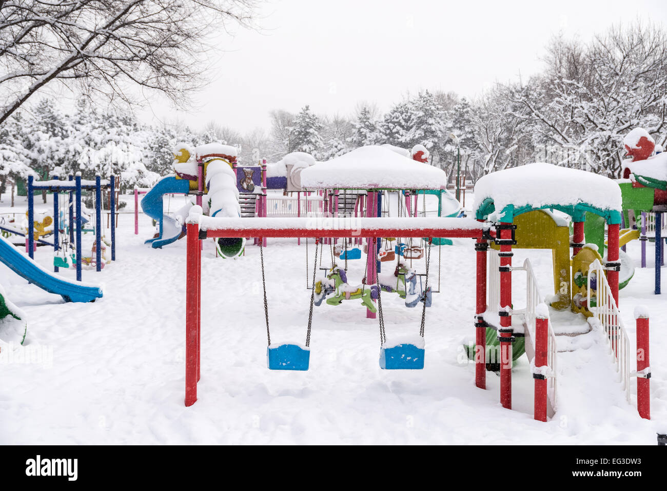 Children Playground In Public Park Covered With Winter Snow Stock Photo ...