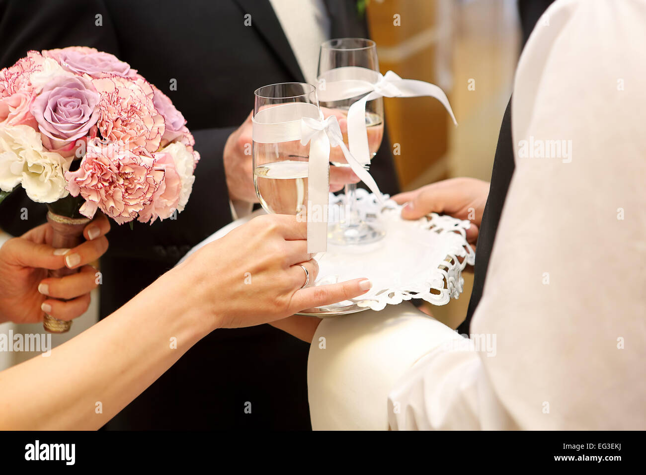 Young couple toasting with champagne at wedding reception Stock Photo ...