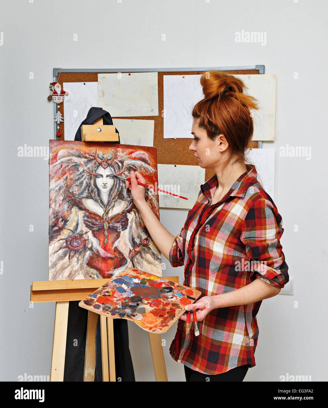 Artist paints picture Stock Photo - Alamy