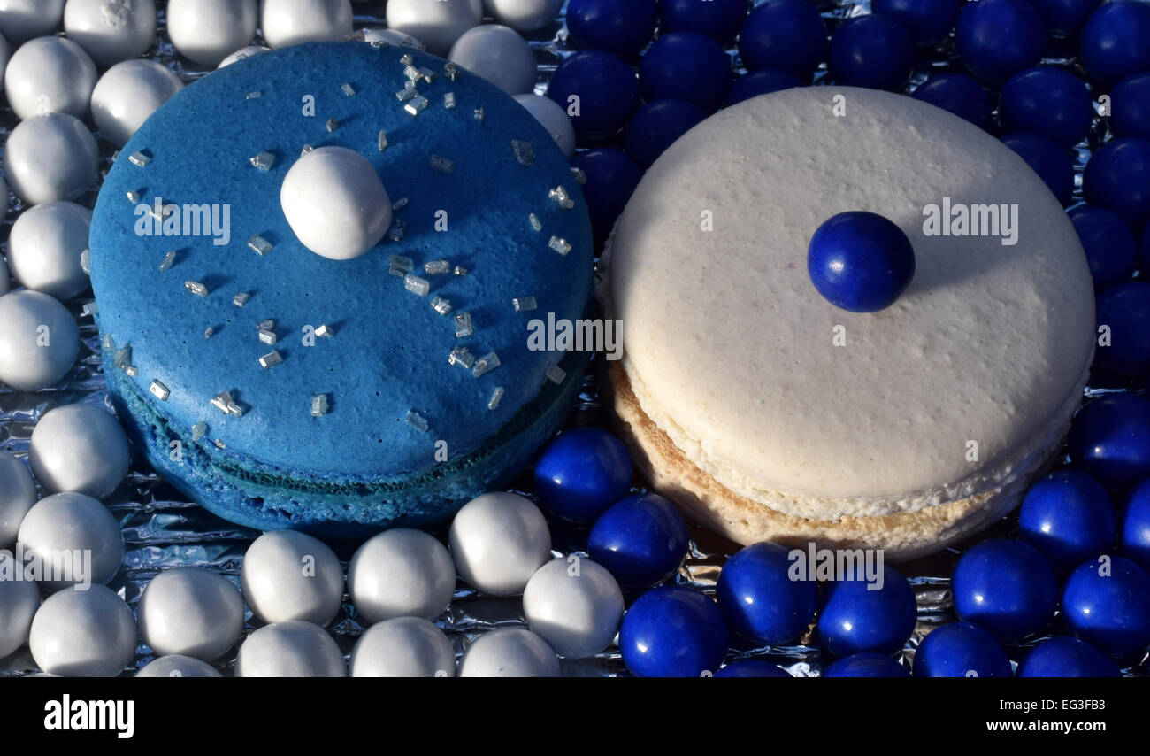 Blue and white cookies with blue and white sweet pearls Stock Photo - Alamy