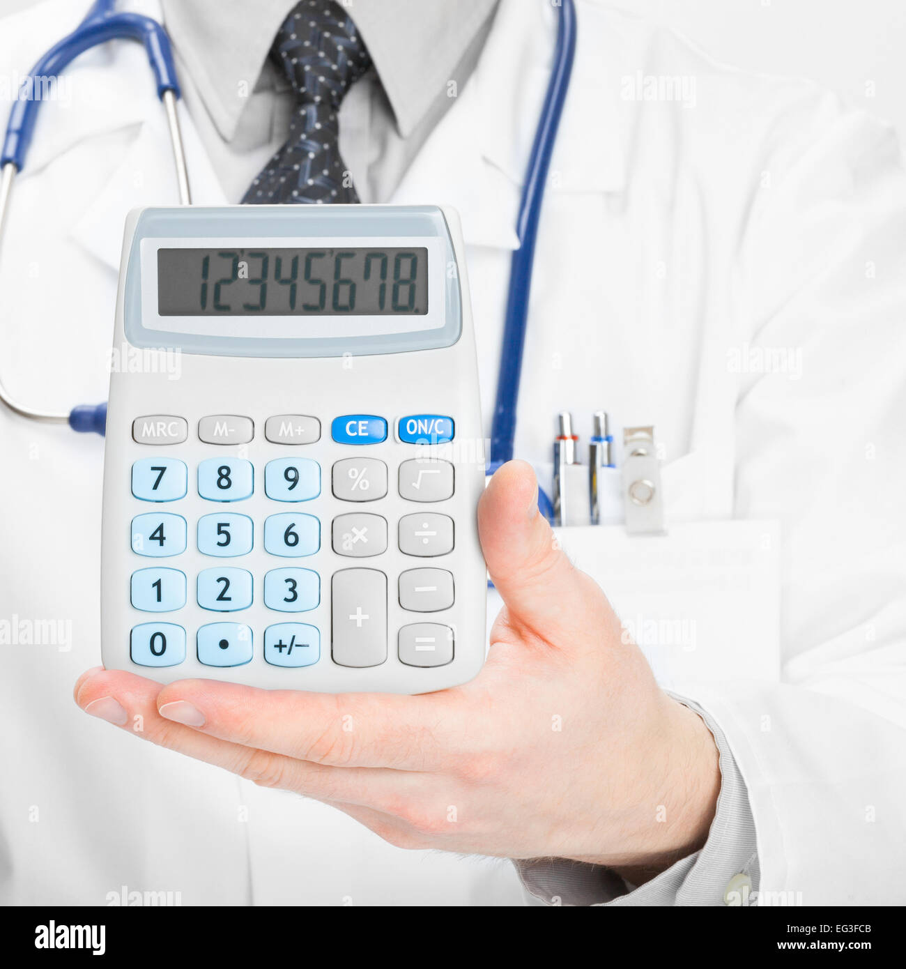 Doctor with calculator - heath care concept Stock Photo - Alamy