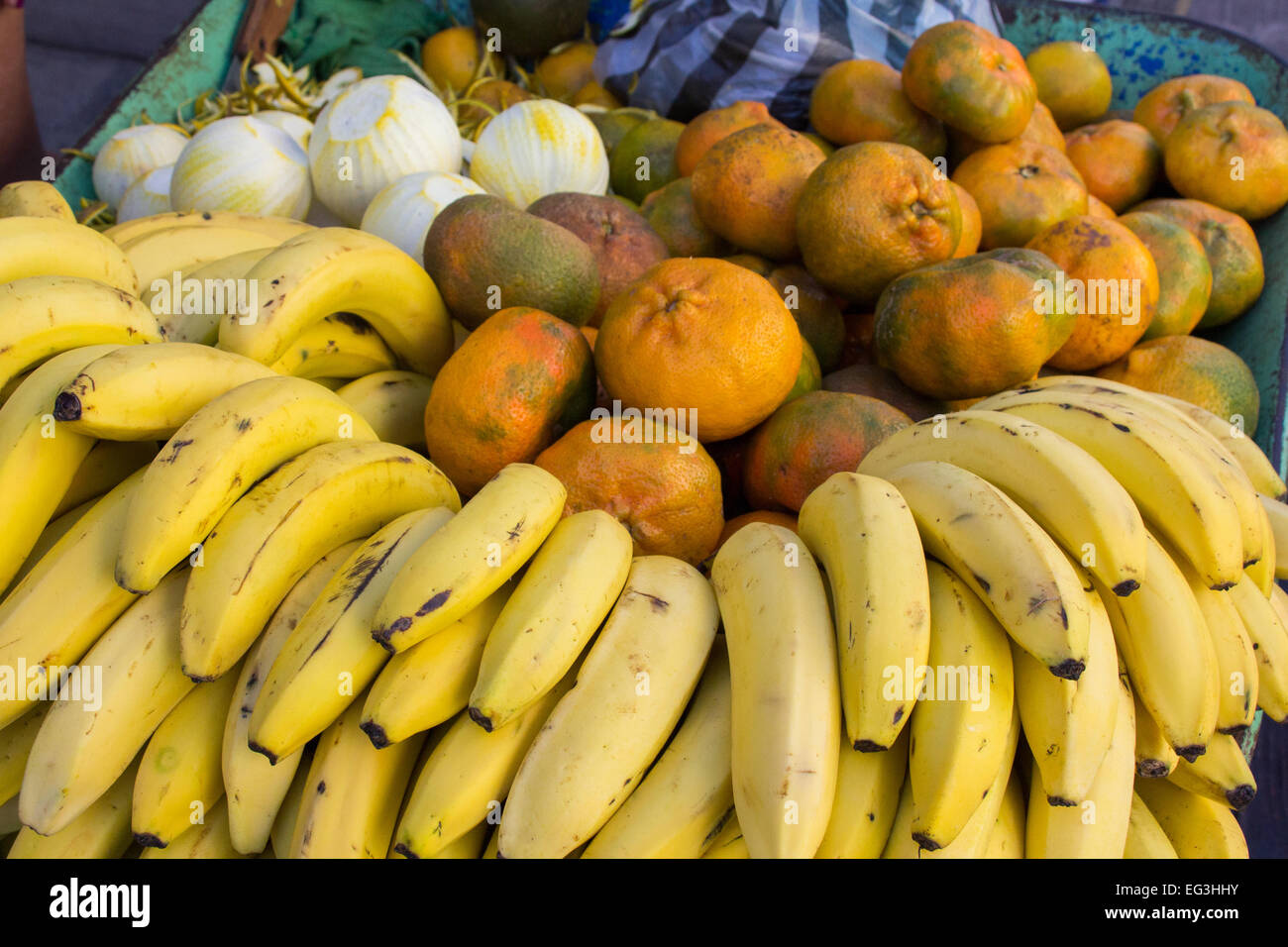 A wheelbarrow filled with fruit in a market in the Dominican Republic ...