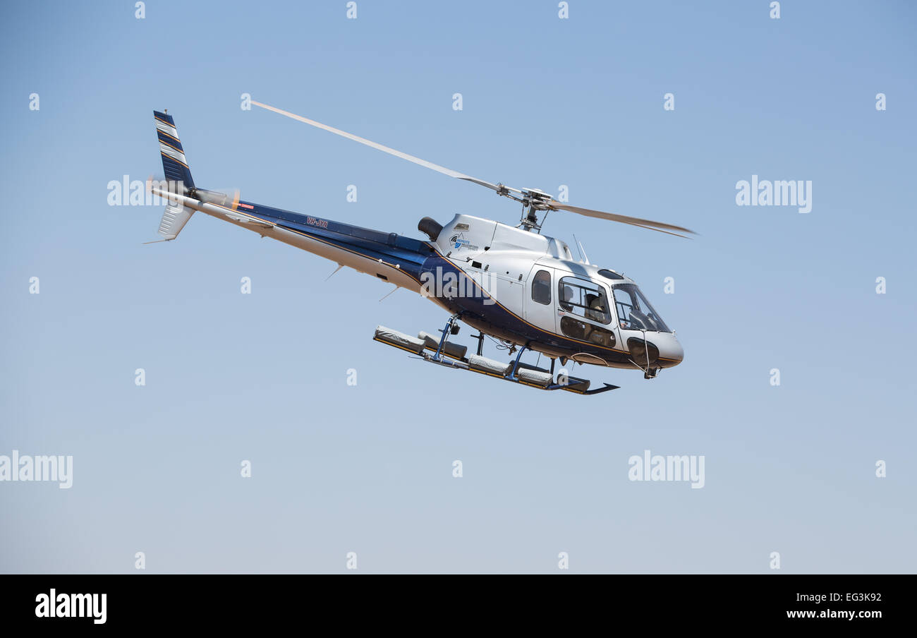 Squirrel helicopter with movie cameraman aboard in Australia Stock ...