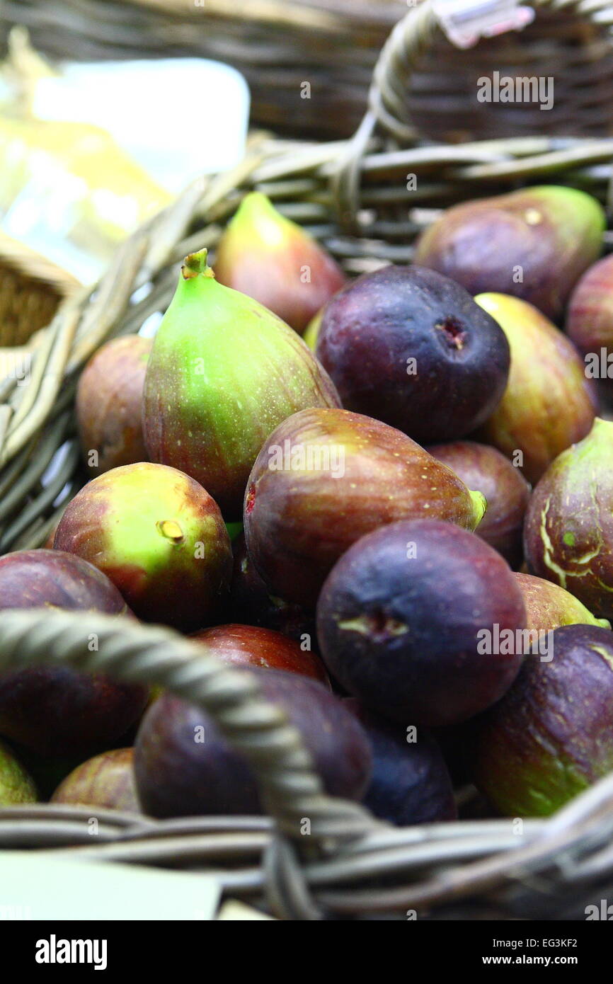 Figs in hand hi-res stock photography and images - Alamy