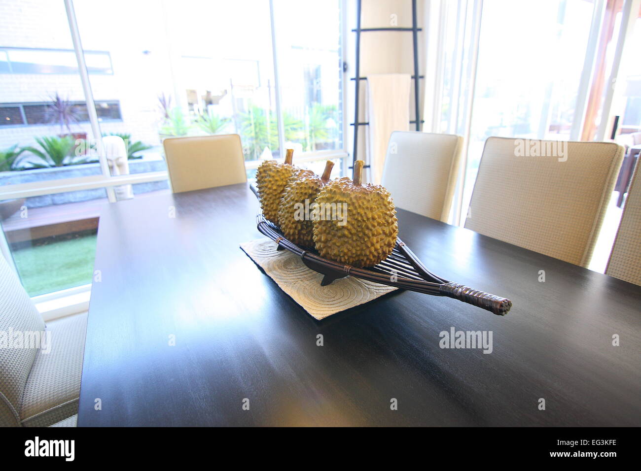 Dining Table in Modern home with Fake Durian Fruit in Display Bowl ...