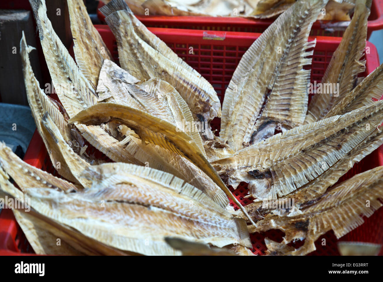 Basket of dried fish for sale at Chinatown Singapore Stock Photo - Alamy