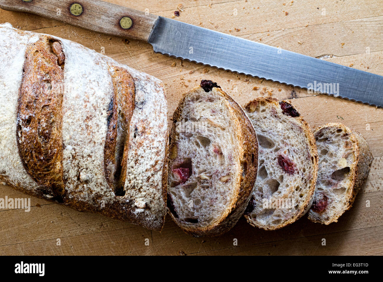 A sliced loaf of cranberry walnut bread Stock Photo - Alamy