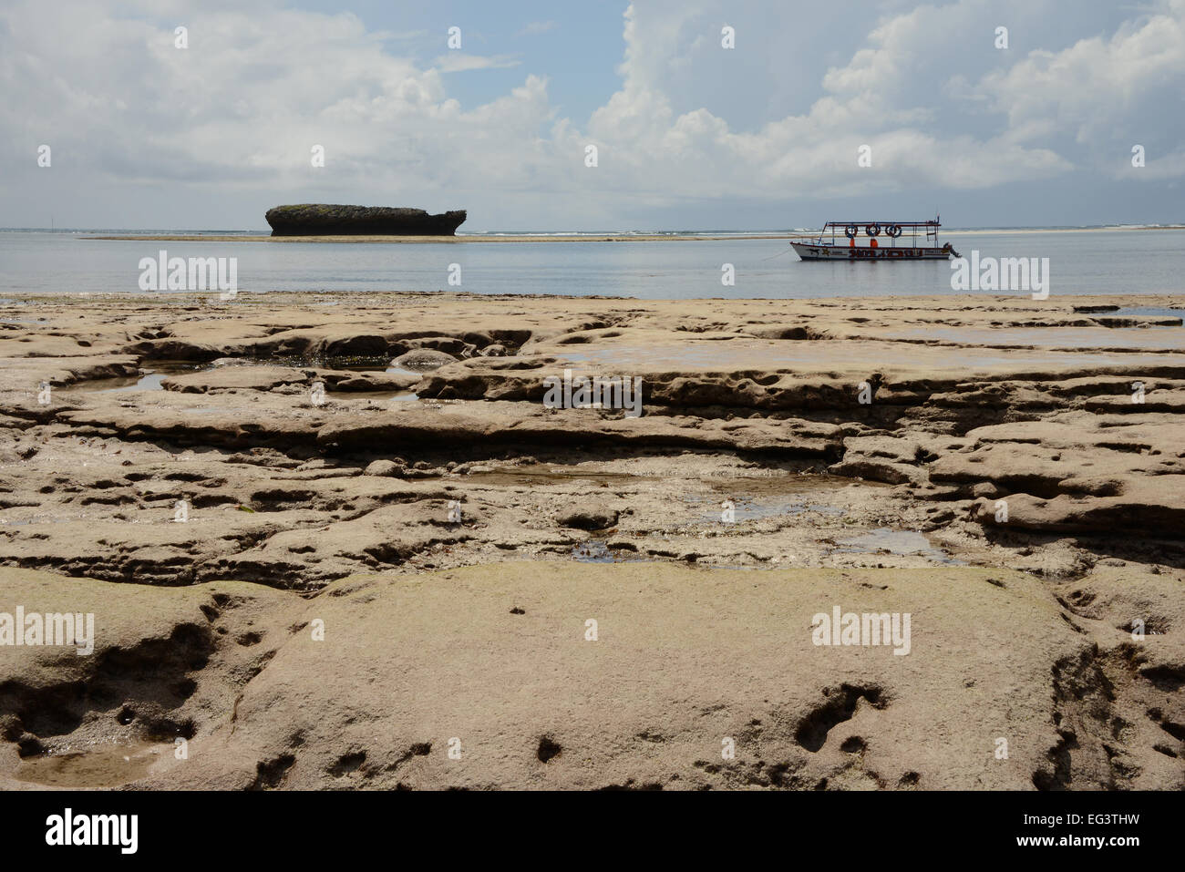 turtle rock at turtle bay with the sea and the coral reef in the ...