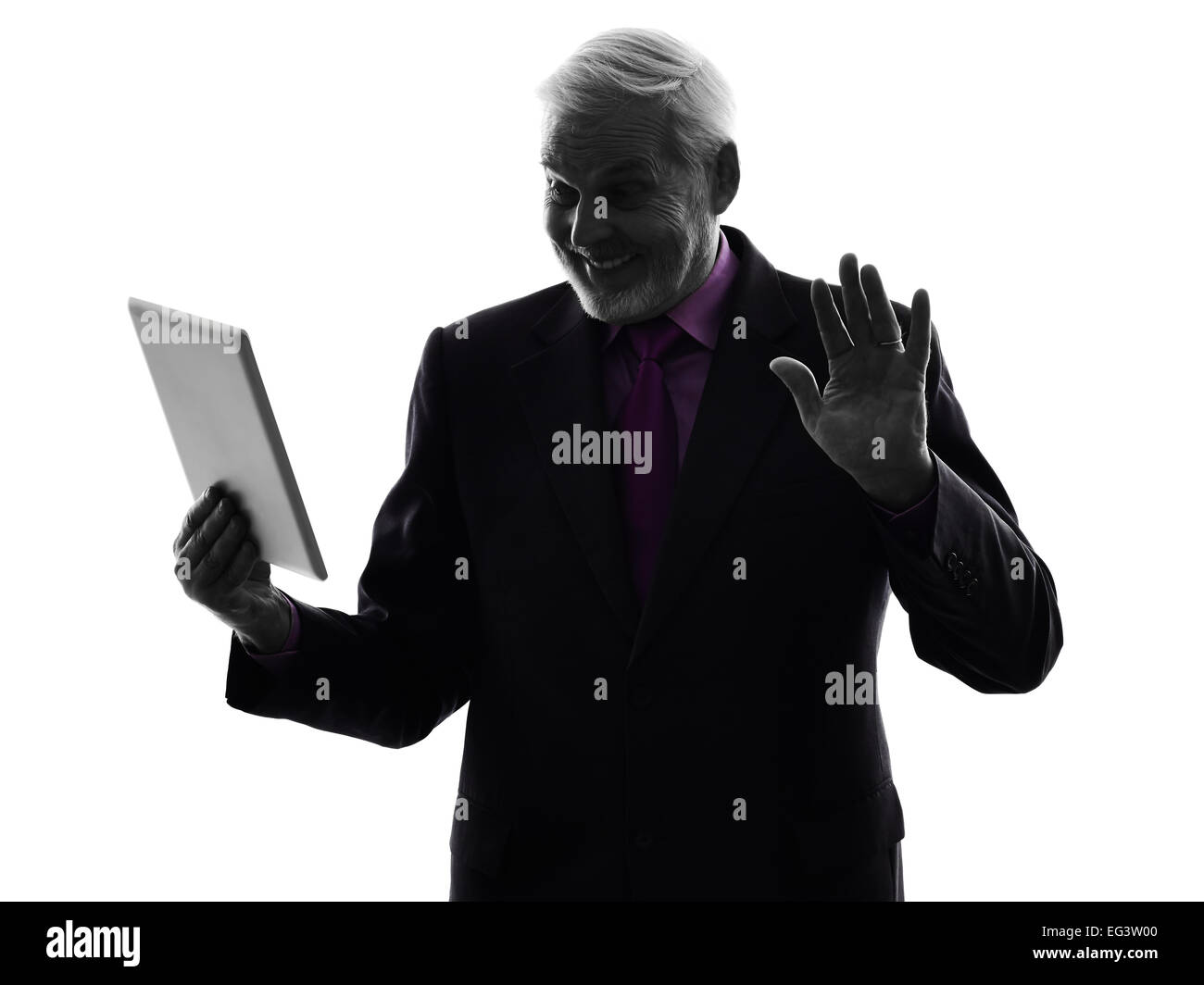 One Caucasian Senior Business Man holding digital tablet saluting ...