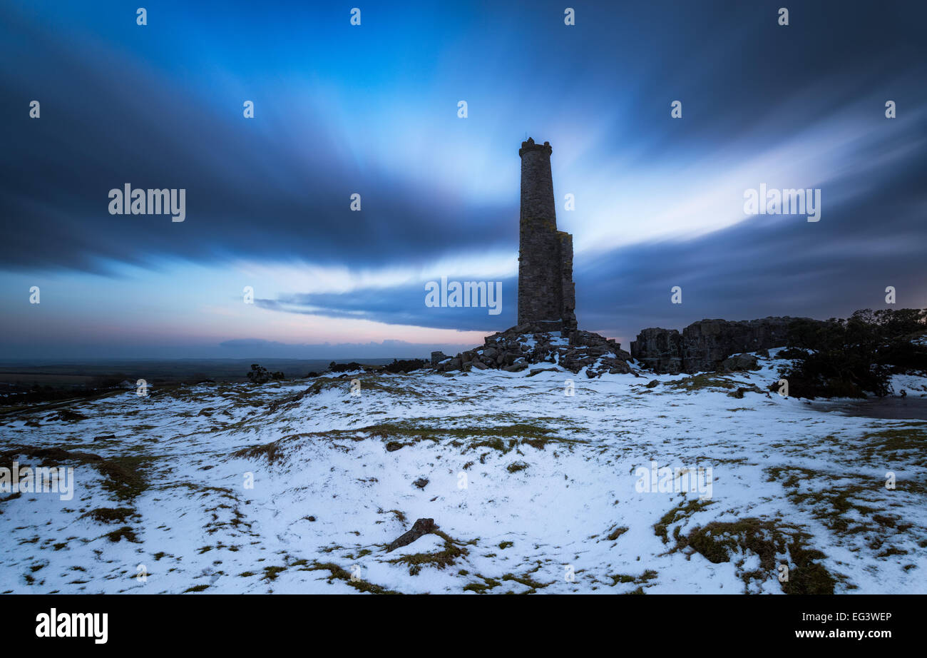 A long exposure of a ruined chimney stack under a dramatic night sky on ...