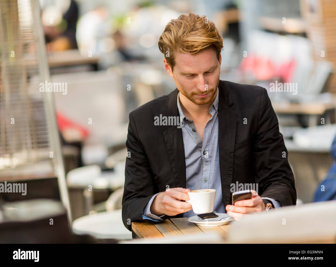 Attractive handsome man in cafe hi-res stock photography and images - Alamy