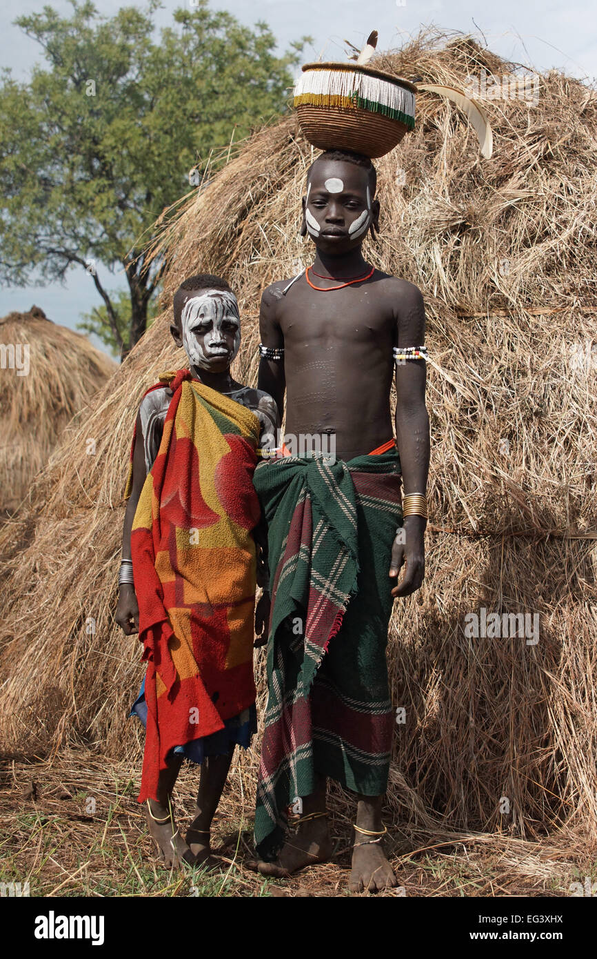 JINKA, ETHIOPIA - NOVEMBER 21, 2014: Mursi children with traditional ...