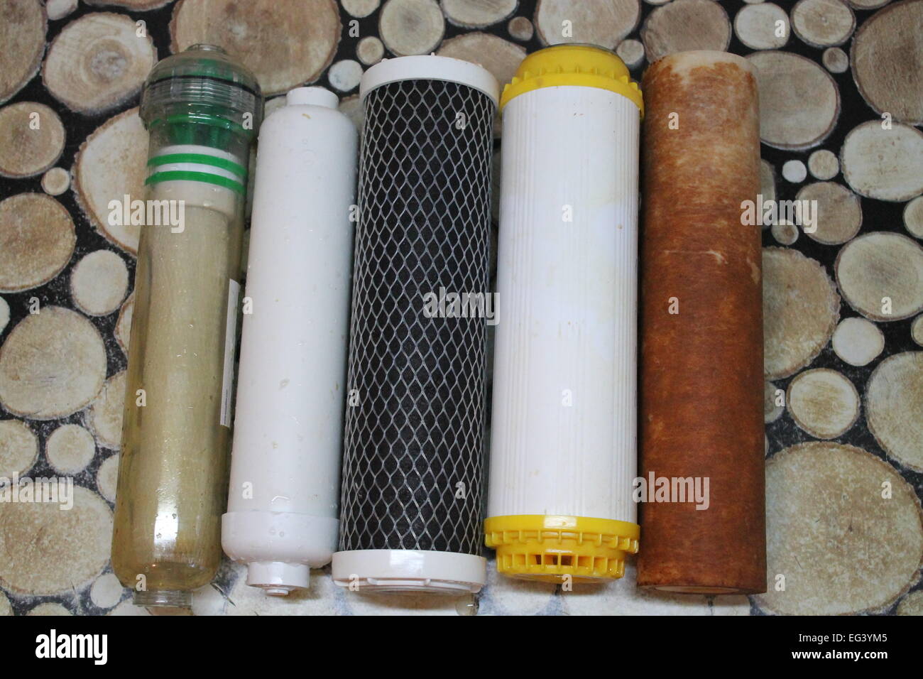 five plastic tubes of filters for cleaning drink water Stock Photo - Alamy