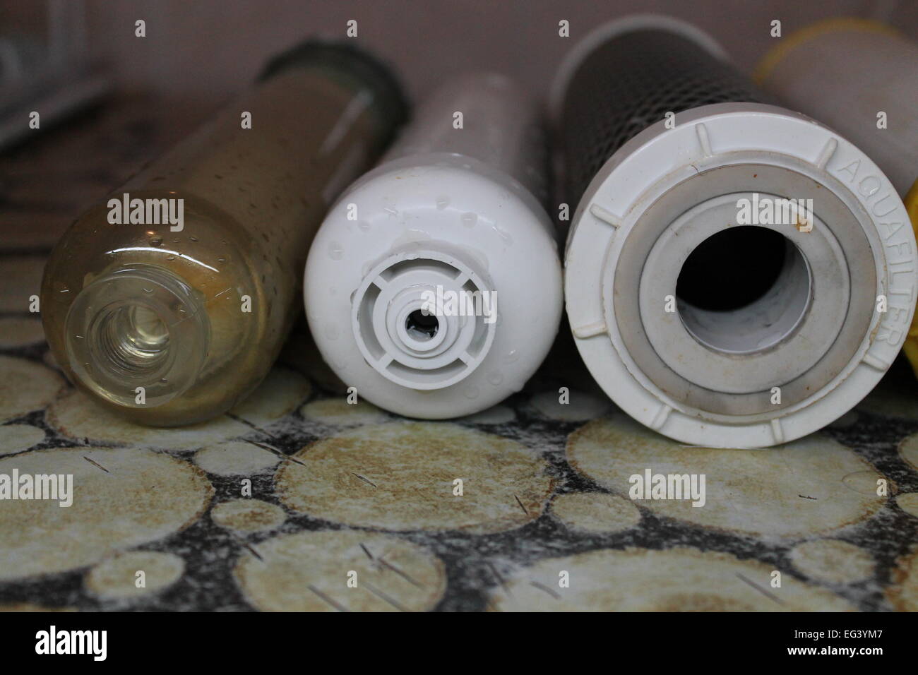 three tube of filter for cleaning drink water Stock Photo - Alamy