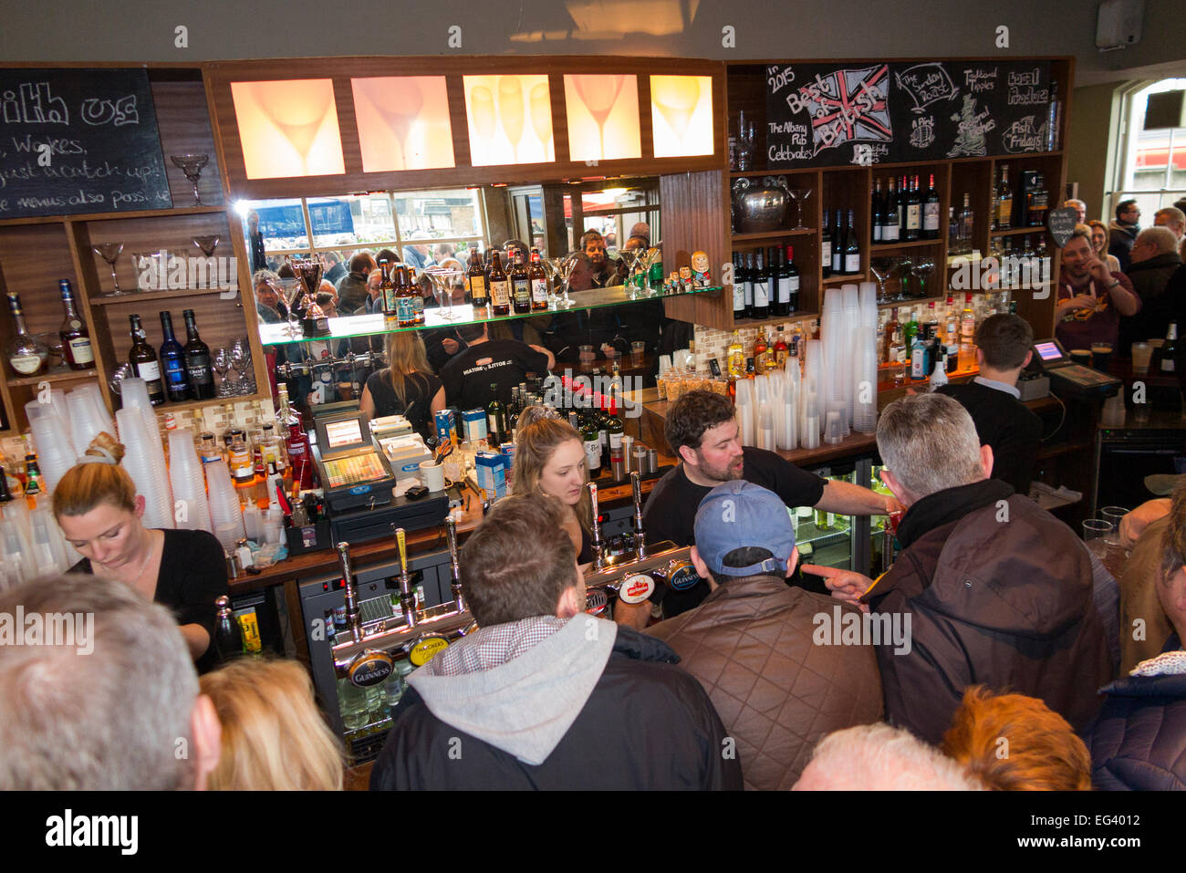 Bar maid pouring drink hi-res stock photography and images - Alamy