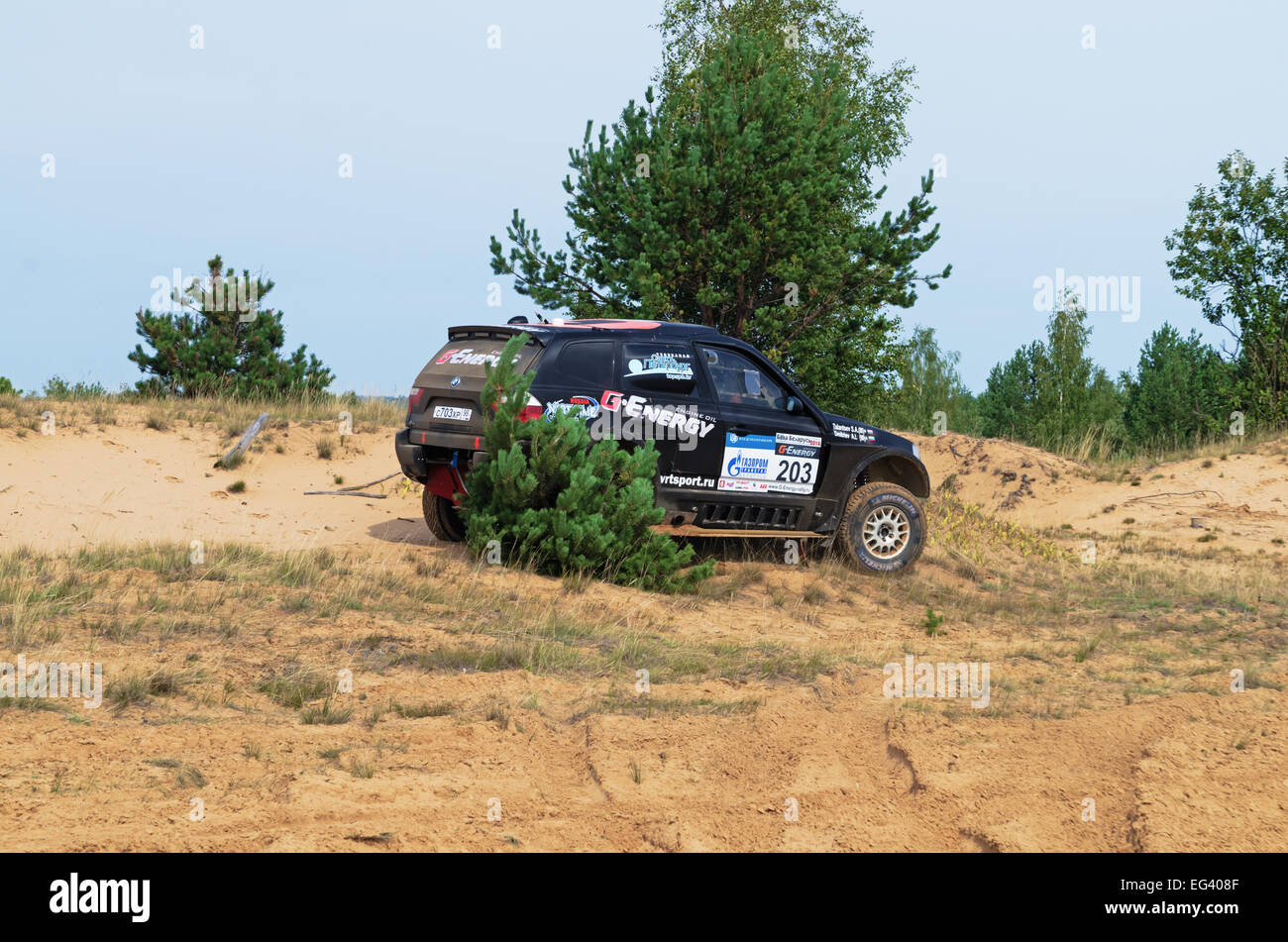 Races on a rally-raid on sandy dunes. Rally-raid Baha "Belarus" 2014 ...