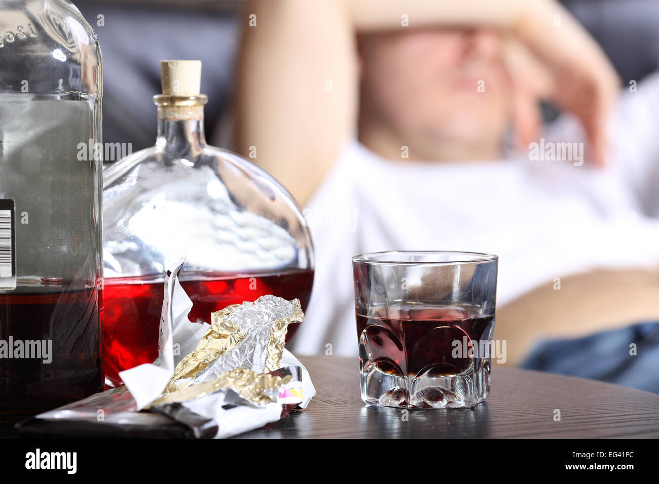 Lazy day - man lying on the bed Stock Photo - Alamy