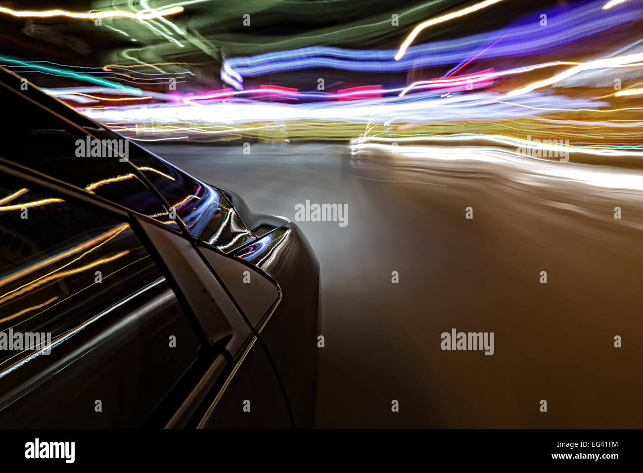 Colorful neon lights and car on the street Stock Photo - Alamy