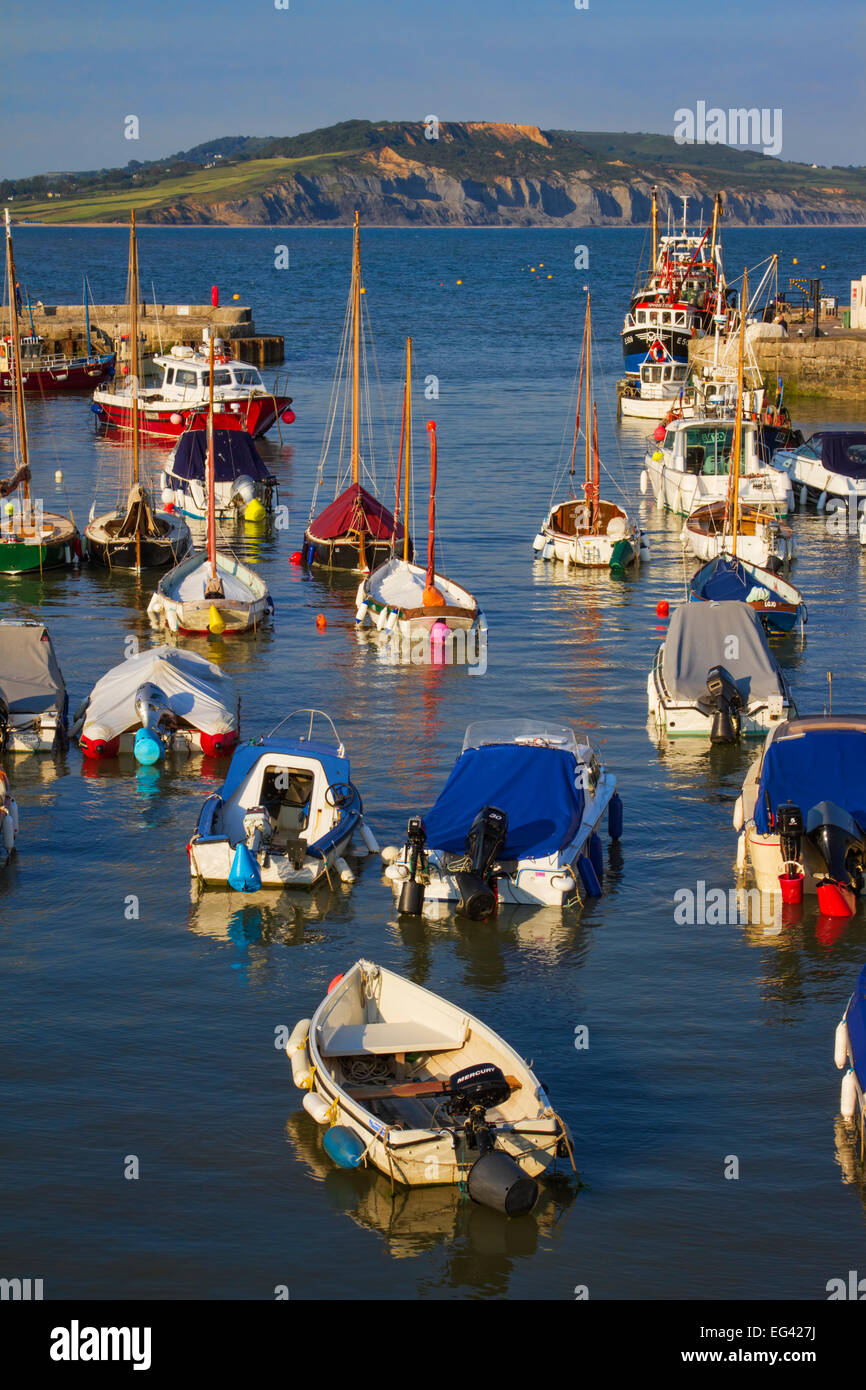 Harbour setting with boats moored calm sea hi-res stock photography and ...
