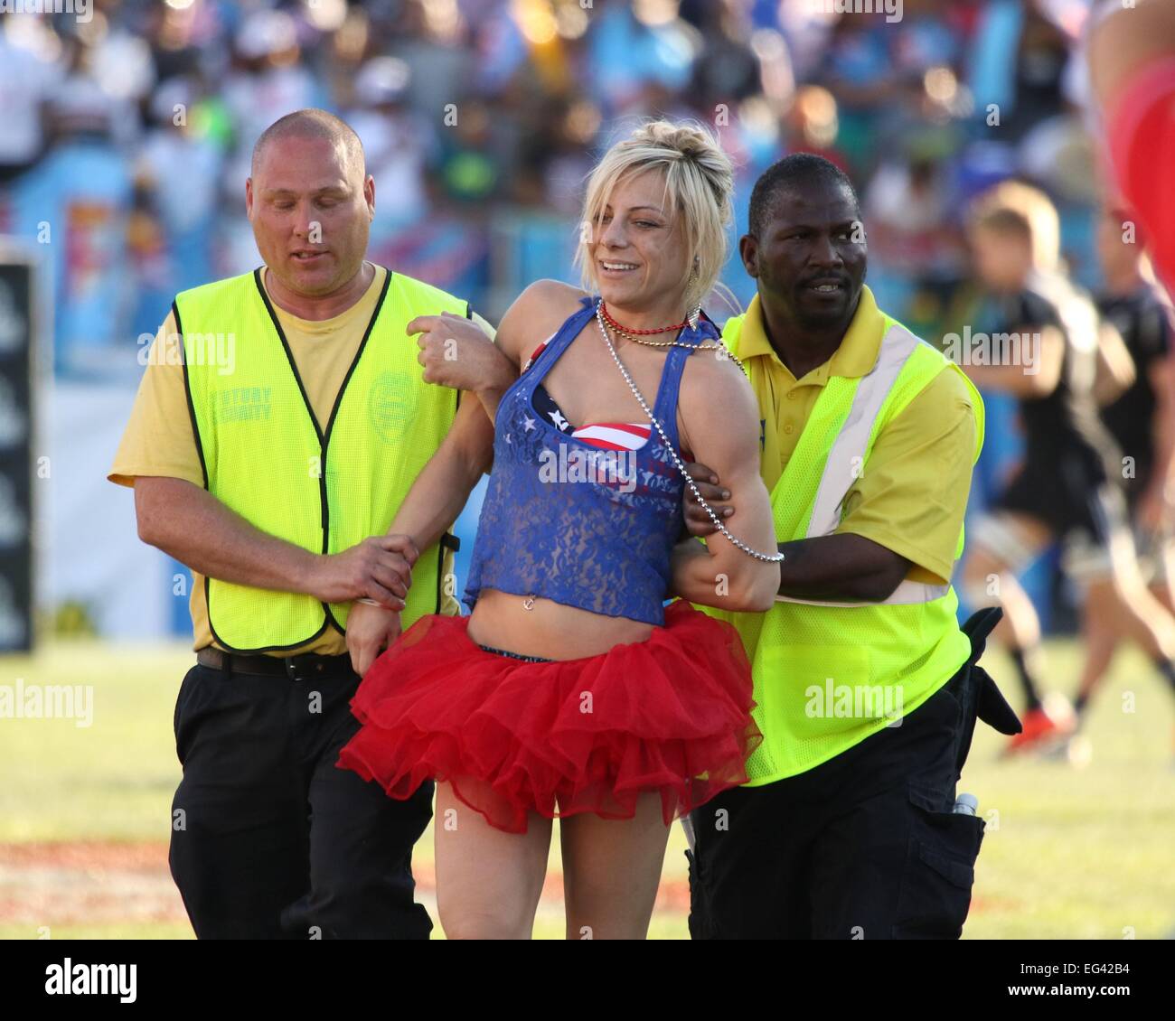 Las Vegas, NV, USA. 15th Feb, 2015. Female Rugby Fan Runs on the Field ...