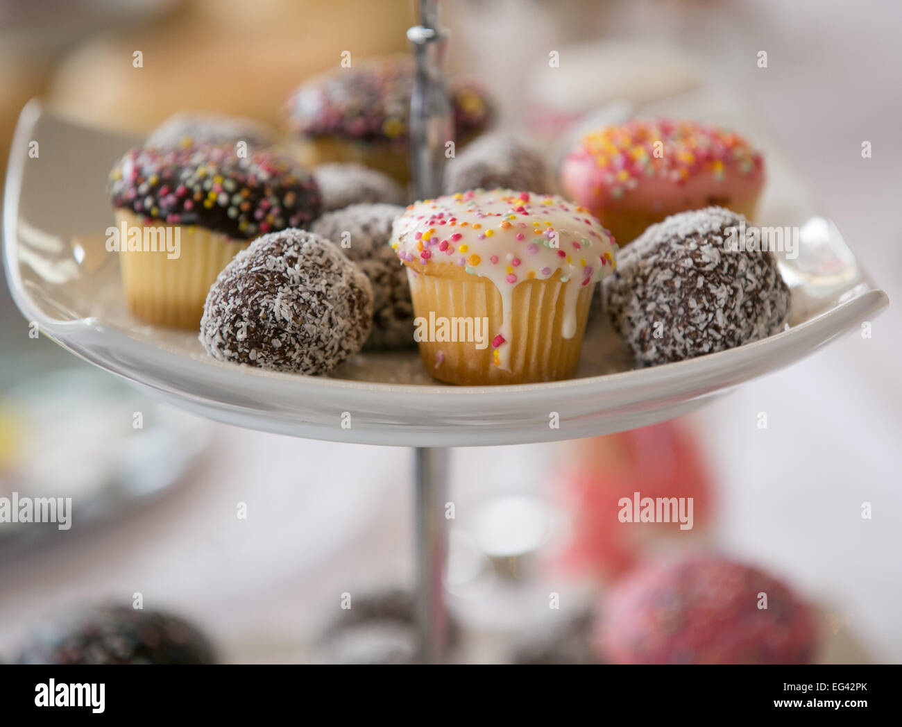Mini cakes at child's birthday party Stock Photo - Alamy