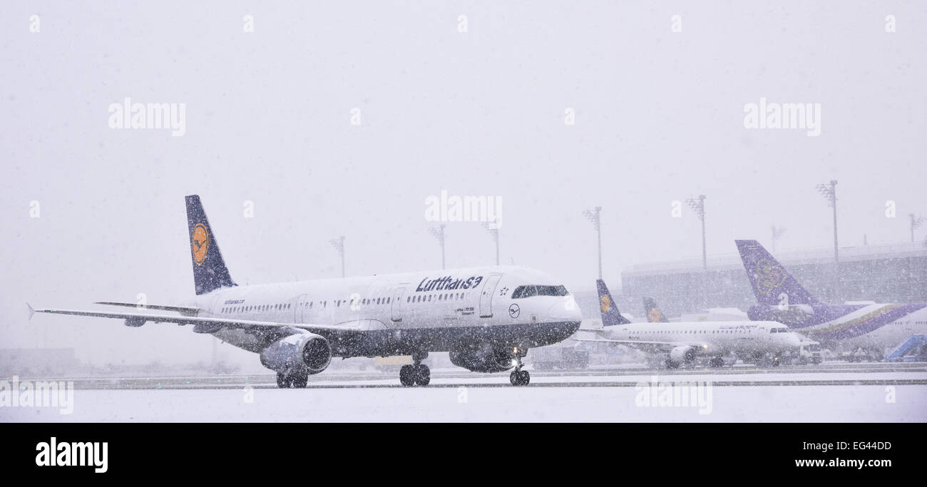 Lufthansa Airbus A321-200 aircraft rolling on the run during snowfall ...