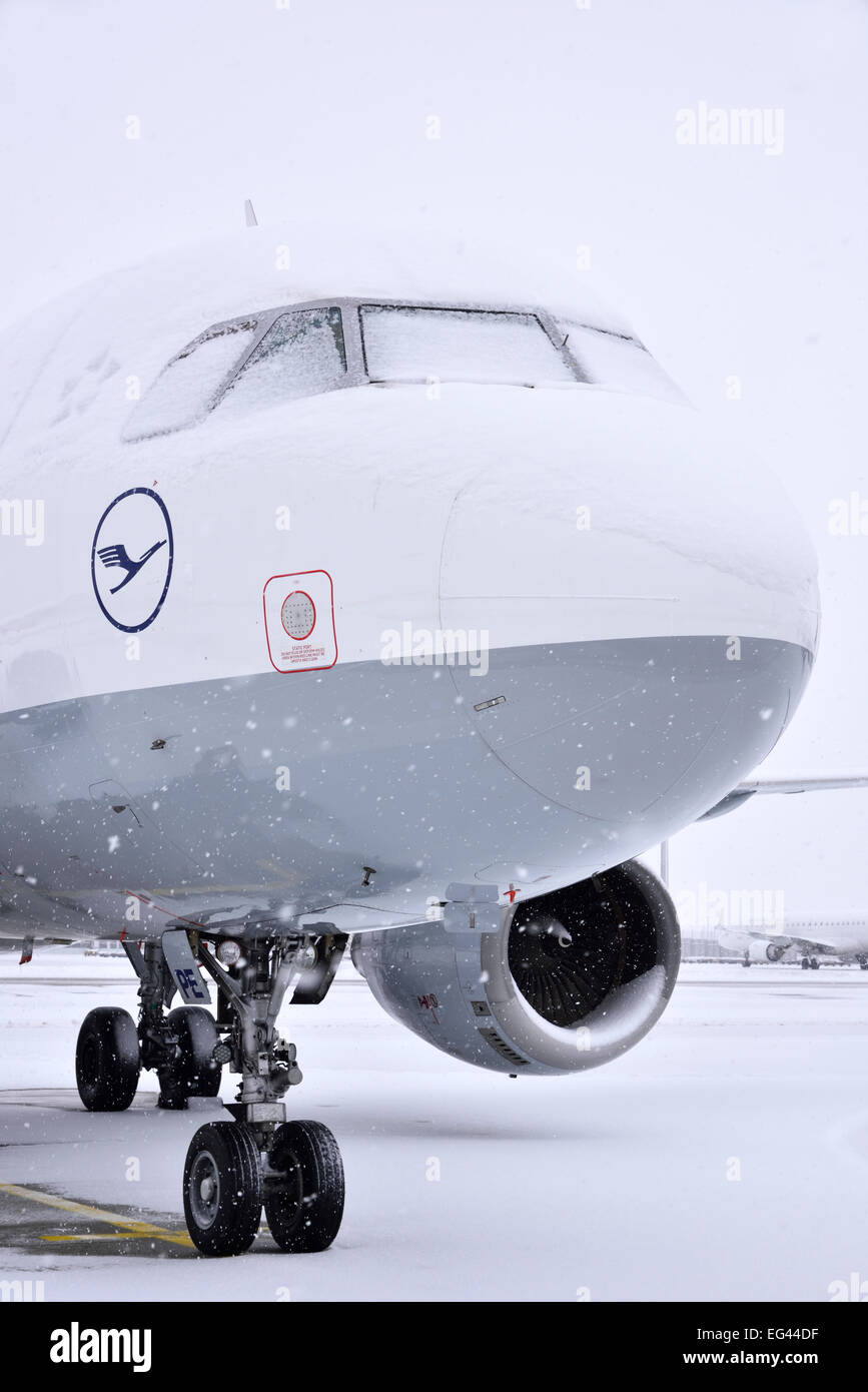 Lufthansa Airbus A 320-200 aircraft in parking position in the snow ...