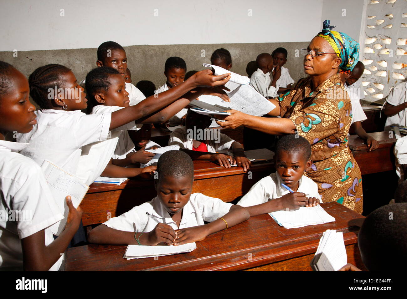 Teacher and school children in school uniform during class, Kinshasa ...
