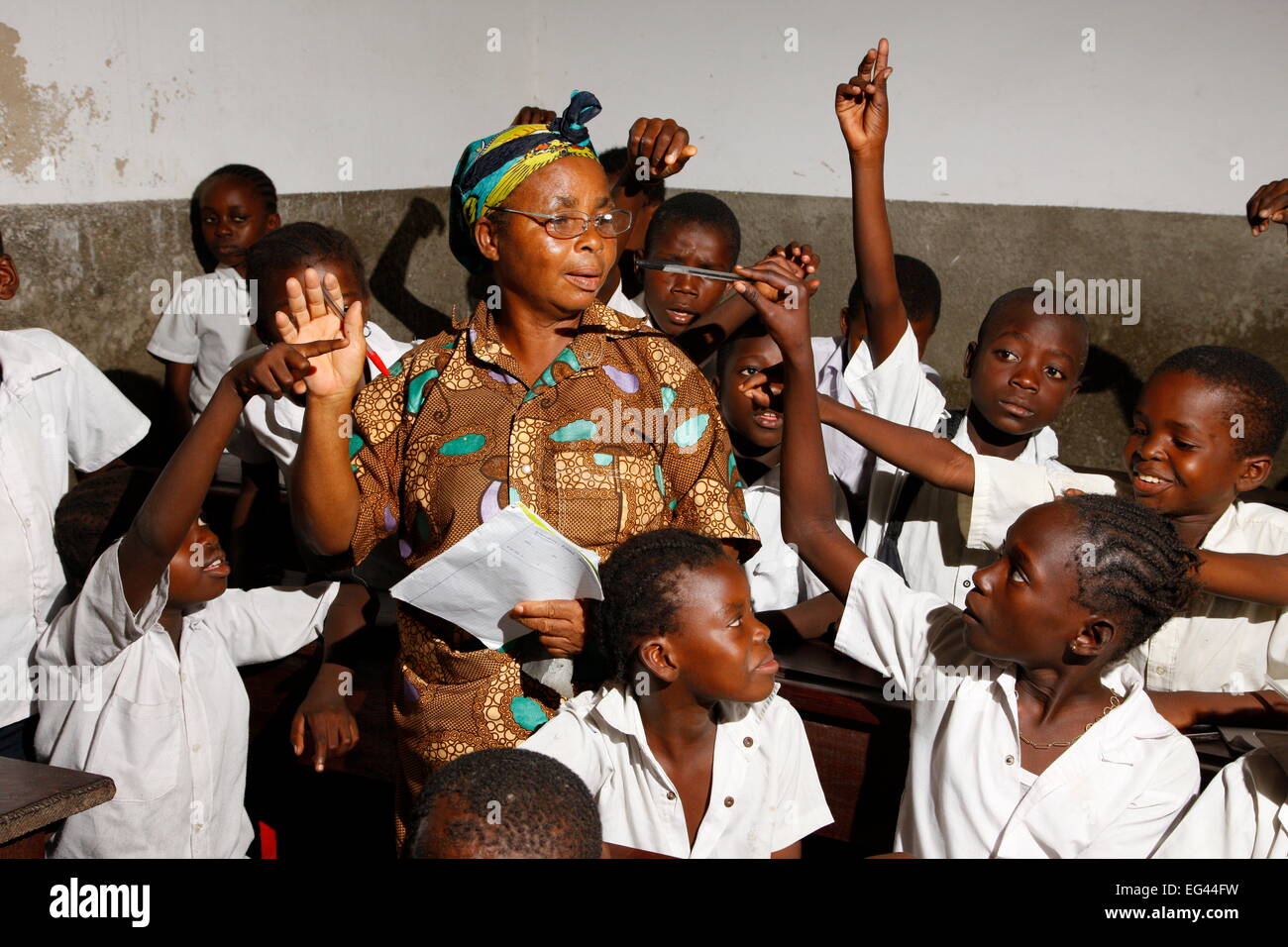 Teacher and school children in school uniform during class, Kinshasa ...